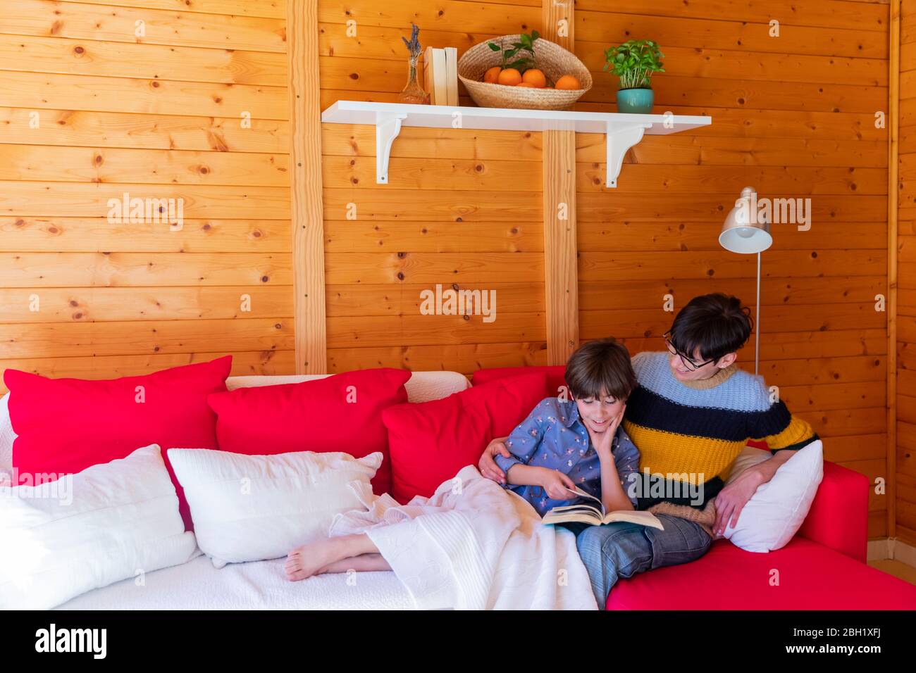 Girl reading on cabin hi-res stock photography and images - Alamy