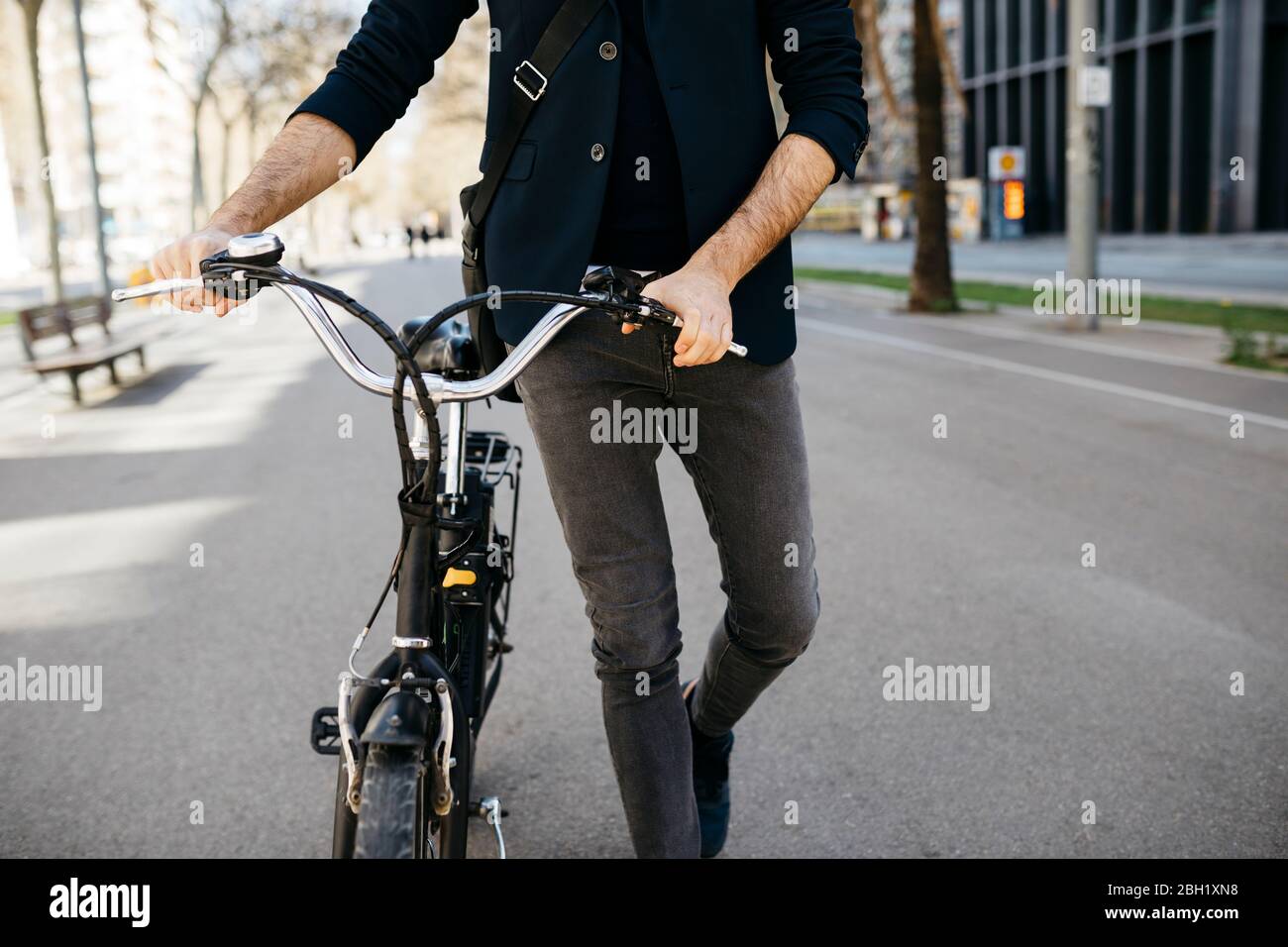 Pushing a bicycle hi-res stock photography and images - Alamy