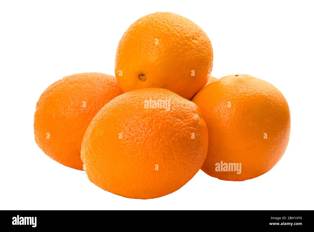 four whole orange on white background Stock Photo - Alamy
