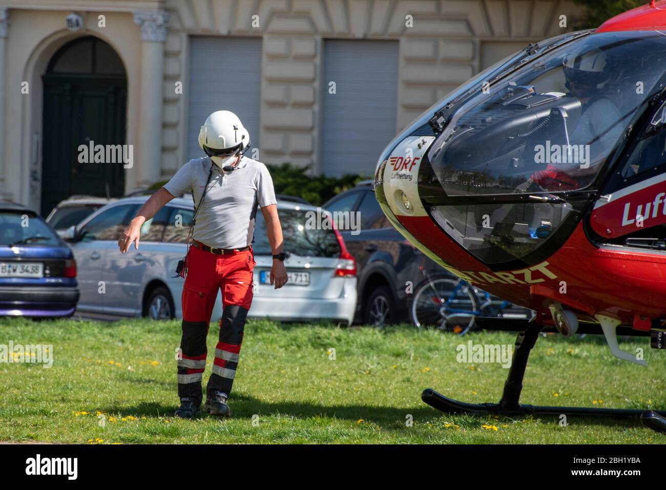 Magdeburg, Germany. 17th Apr, 2020. An emergency paramedic wearing a ...