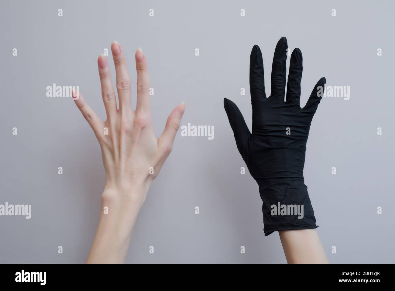 Gloved hands hi-res stock photography and images - Alamy