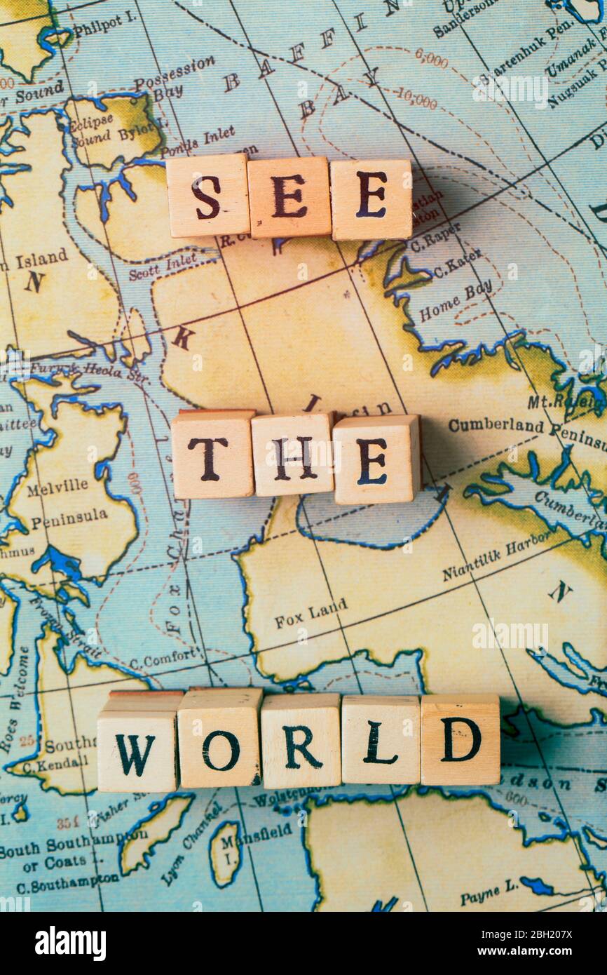 See the world written in wooden blocks on a vintage travel map Stock ...