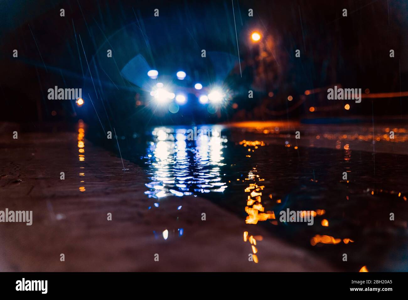 Surface view police car driving middle rainy night hi-res stock ...