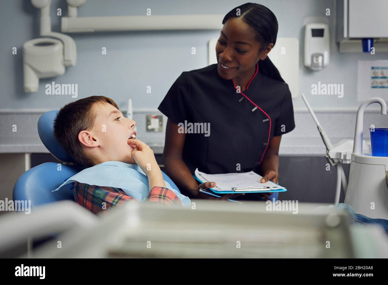 Children receiving medicine hi-res stock photography and images - Alamy