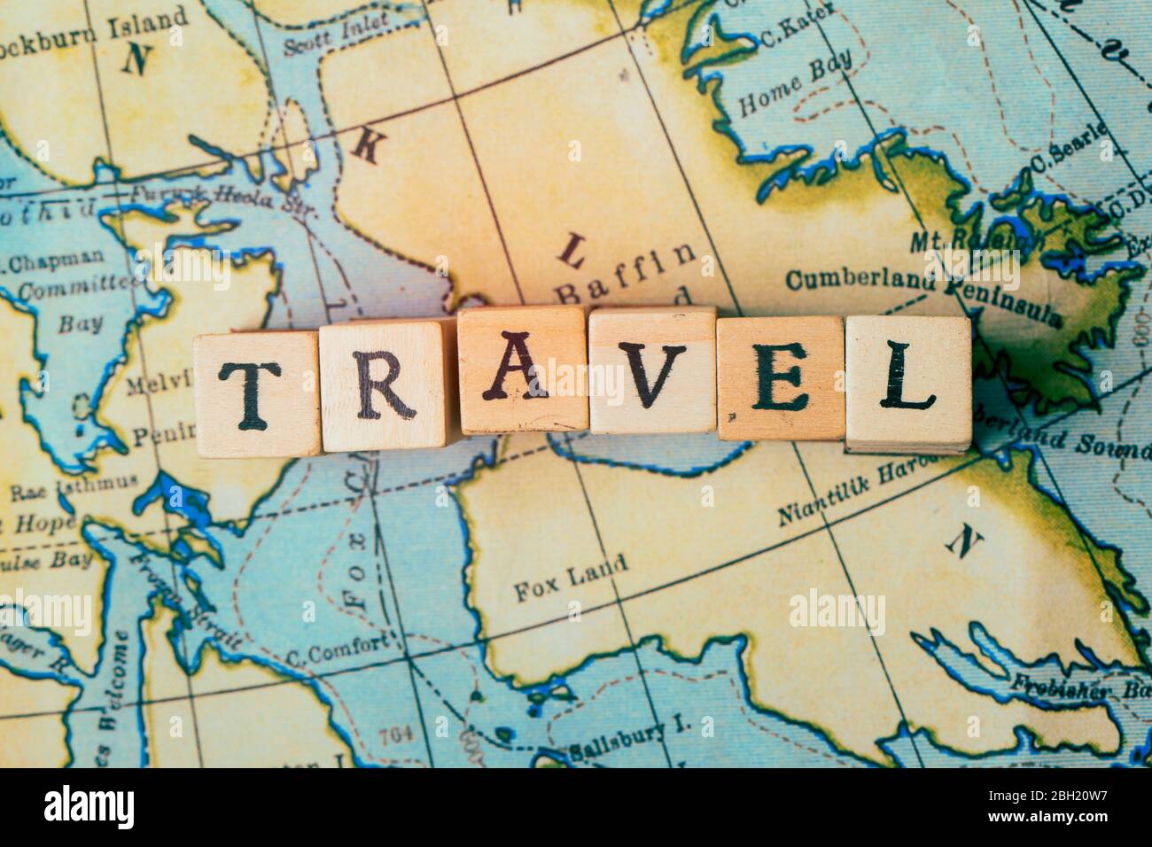 Travel word written in wooden blocks on a vintage travel map Stock ...