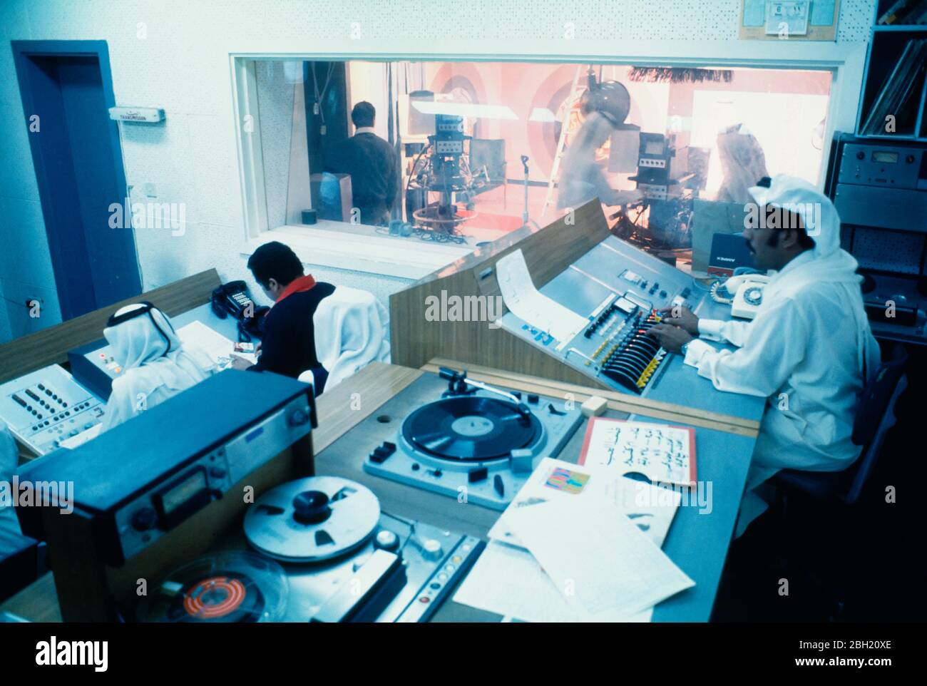 Qatar, Media, Men working in television control suite Stock Photo - Alamy