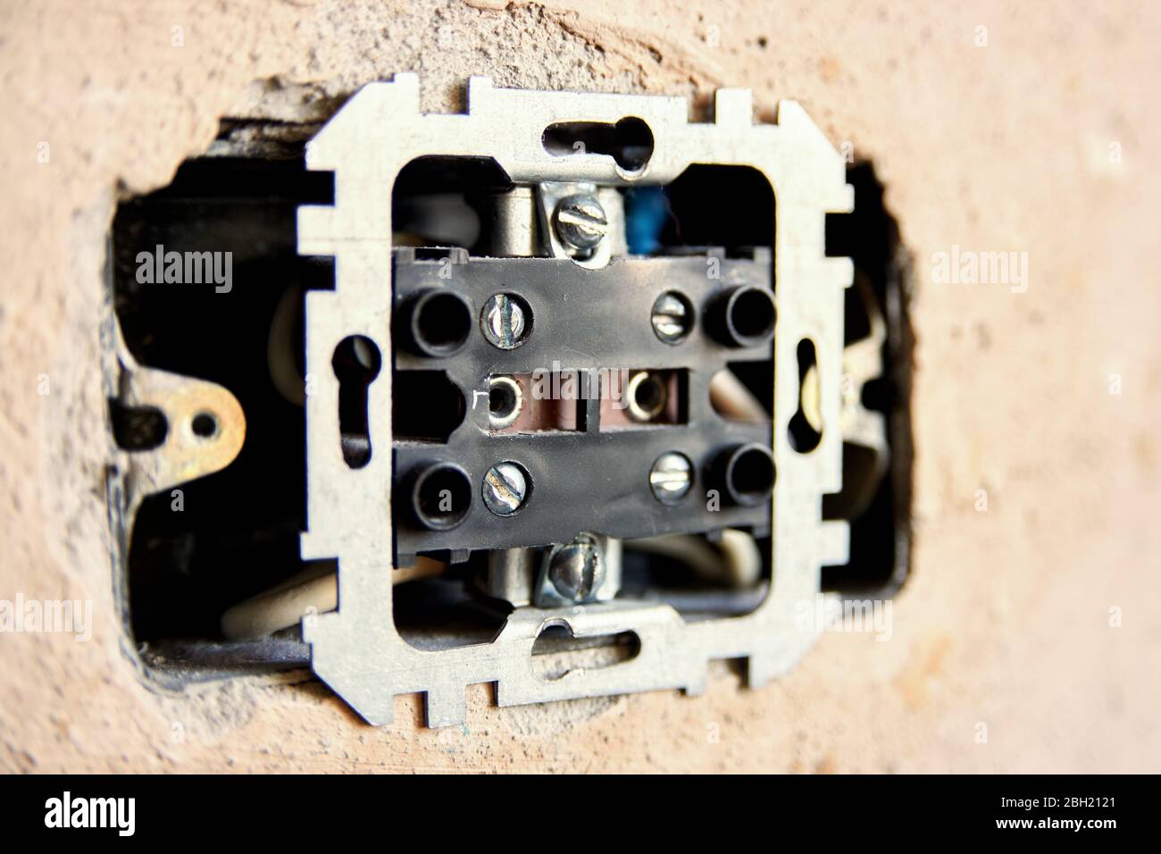 broken socket in concrete wall Stock Photo - Alamy