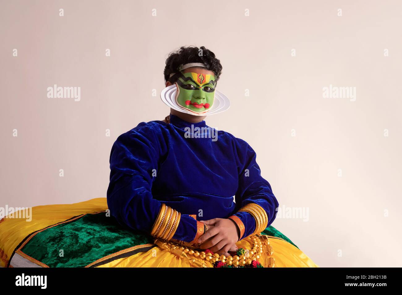 Kathakali dancer smiling in his traditional costume Stock Photo - Alamy