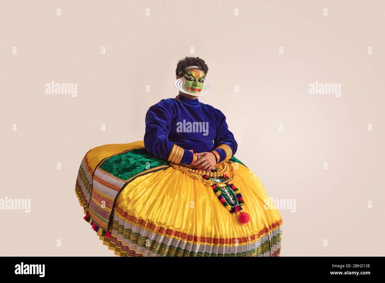 Kathakali dancer smiling in his traditional costume Stock Photo - Alamy