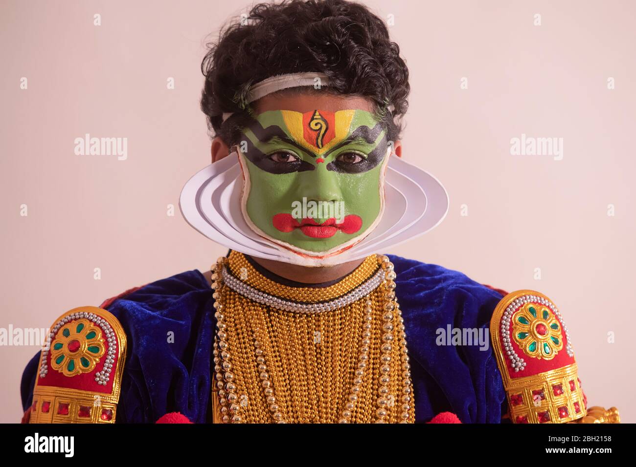 Kathakali dancer in front of white background after getting ready Stock ...