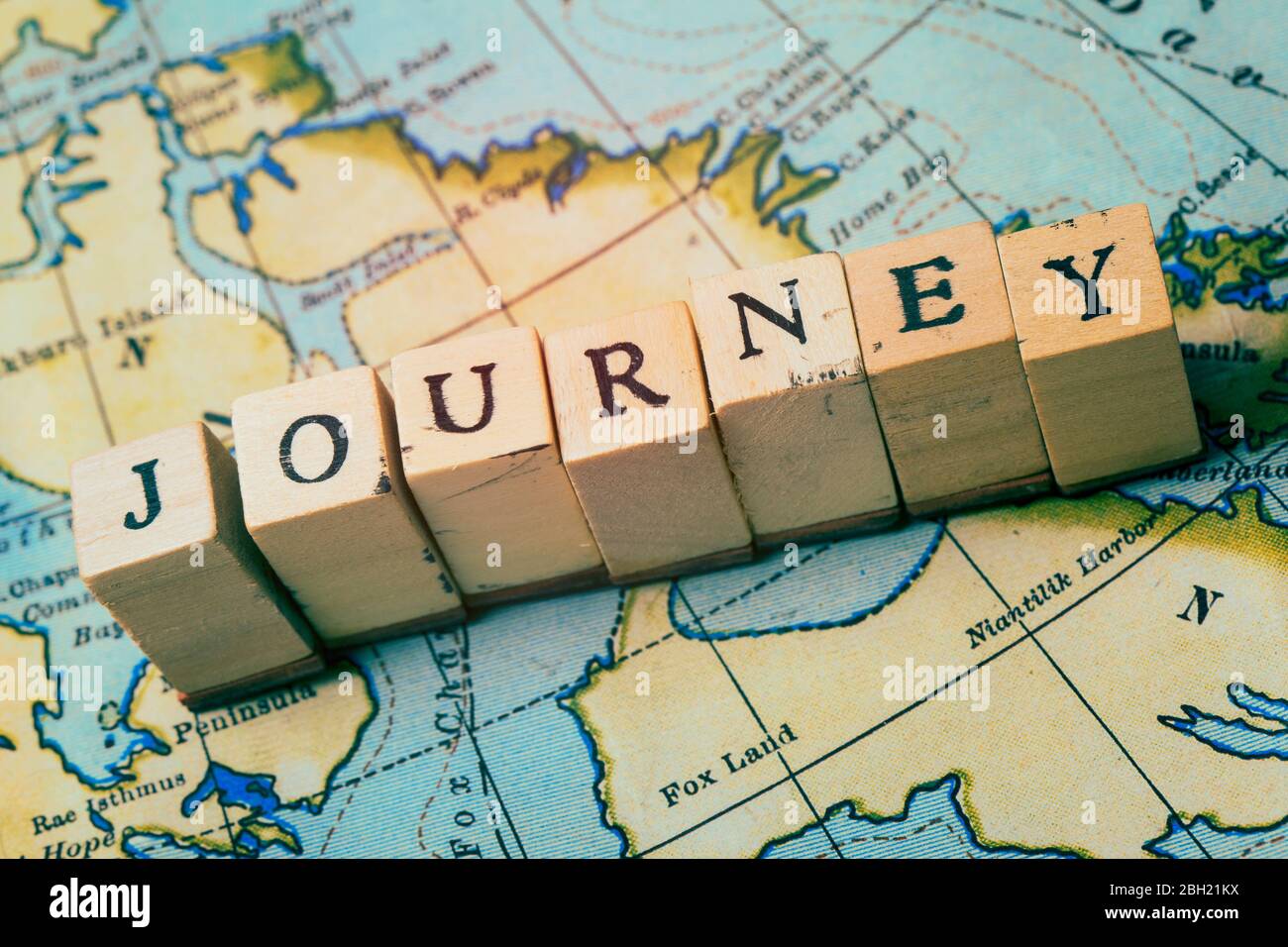 Journey word written in wooden blocks on a vintage travel map Stock ...