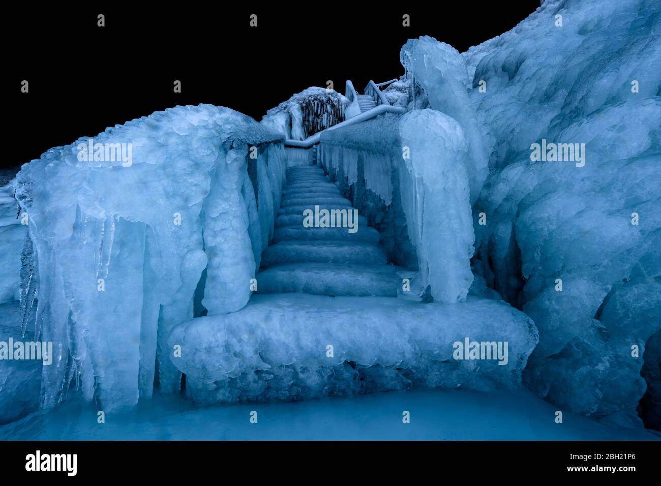 Frozen steps leading to seljalandsfoss waterfall hi-res stock ...