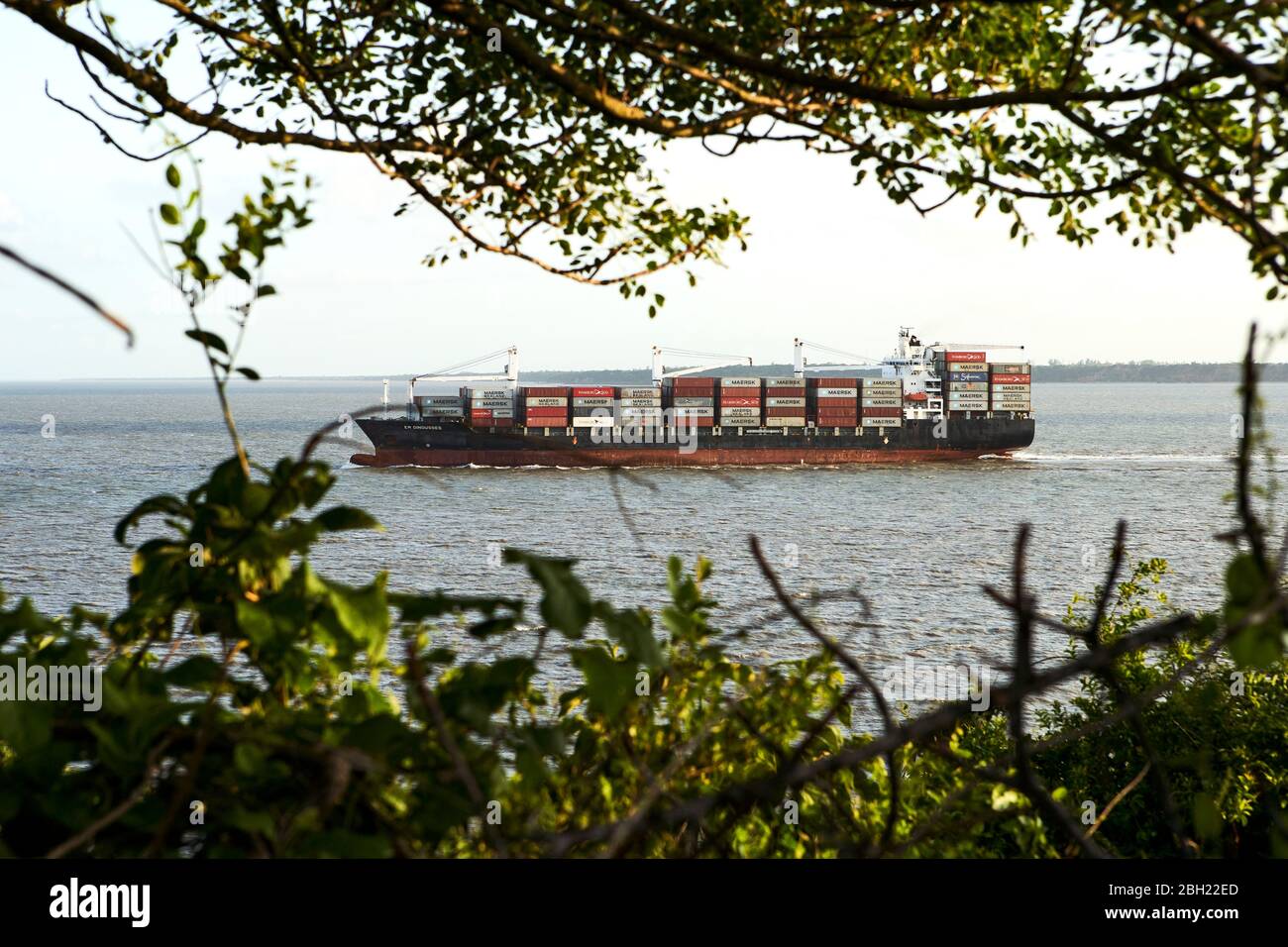 Fully loaded container ship sailing across maputo bay hi-res stock ...