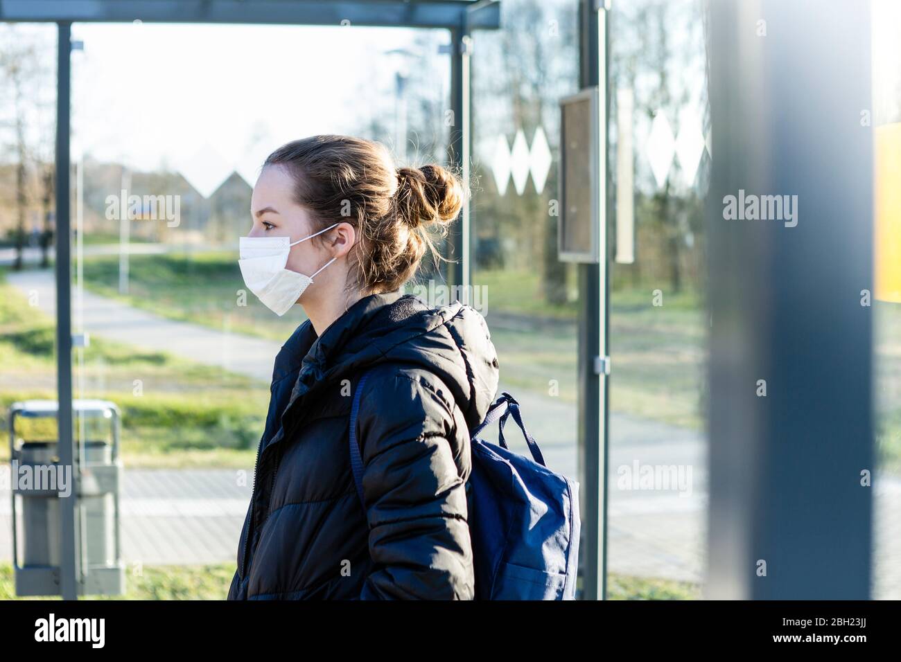Girl alone at bus stop hi-res stock photography and images - Alamy
