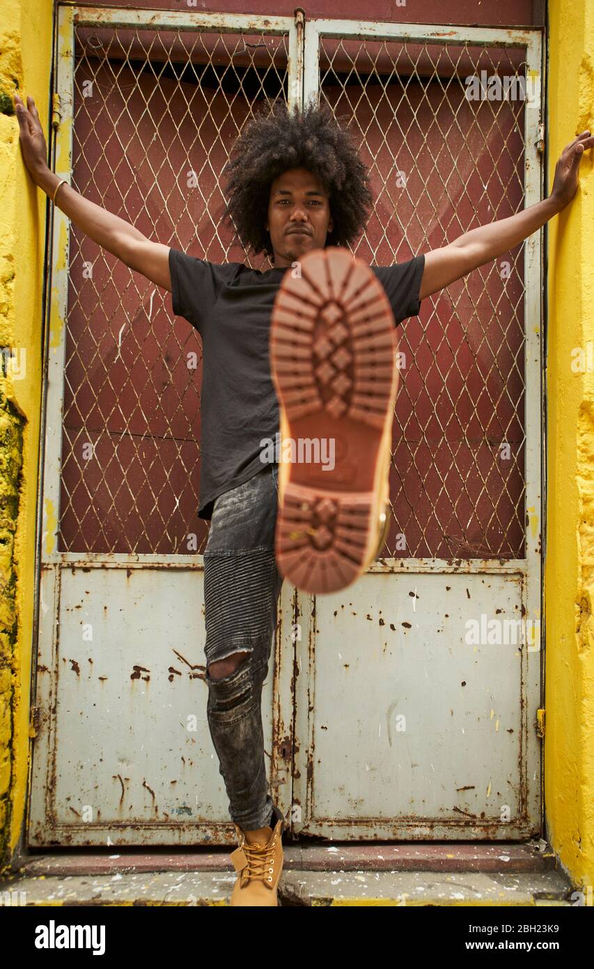 Man kicking down door hi-res stock photography and images - Alamy