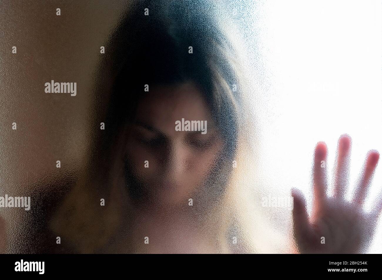 Woman blurred glass hi-res stock photography and images - Alamy