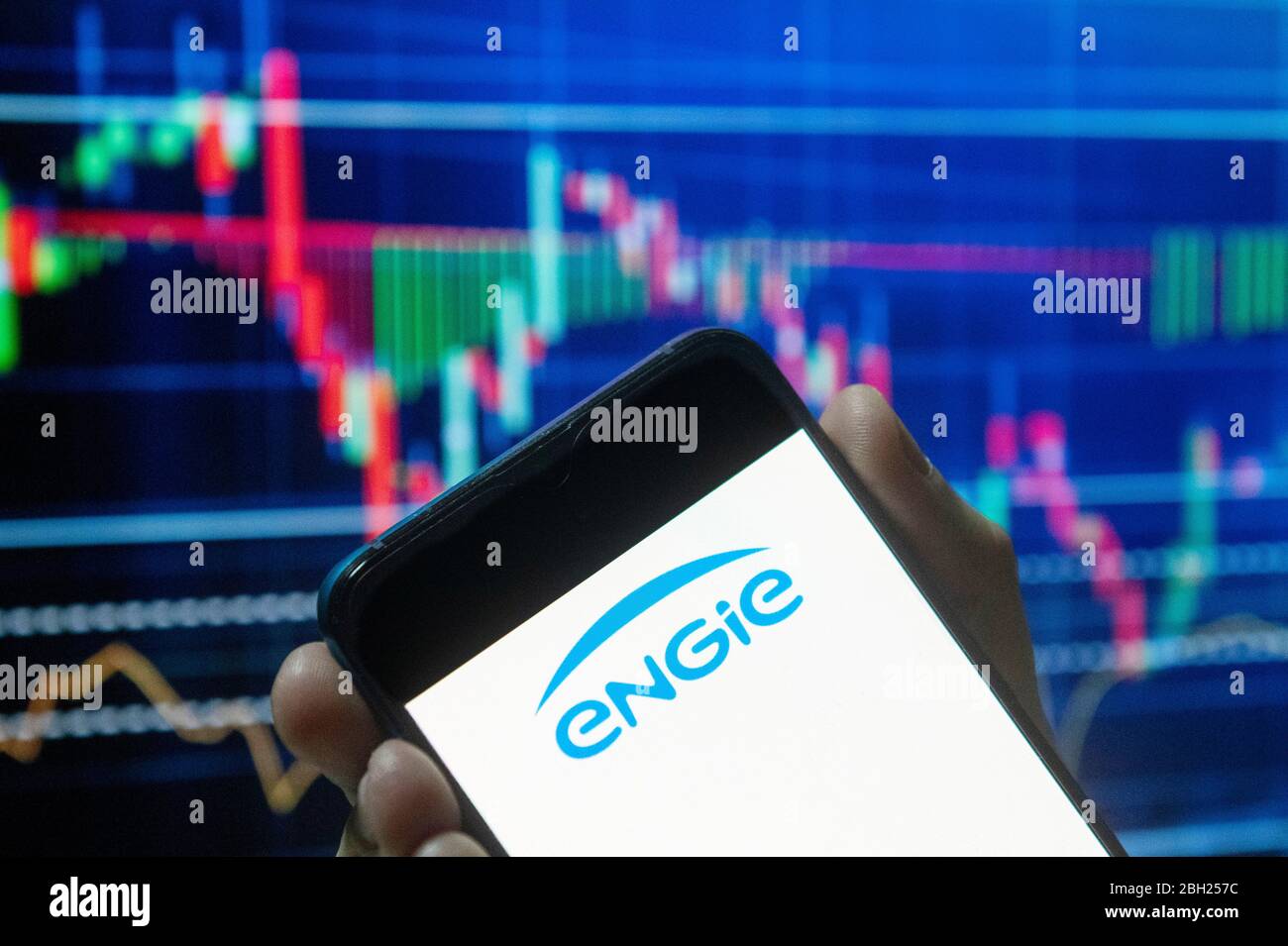 In this photo illustration a French multinational gas and oil company ...