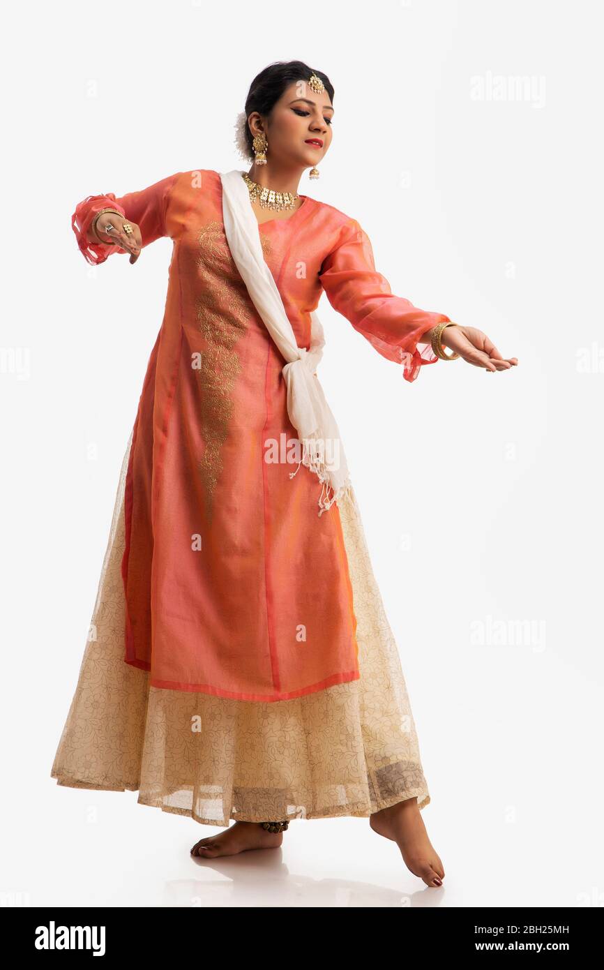 Graceful kathak dancer performing over a white background Stock Photo ...