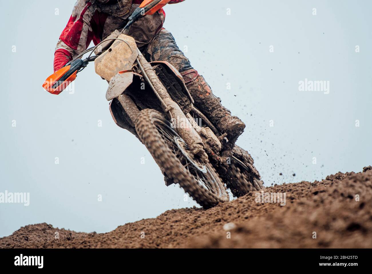 Motocross driver during motocross race Stock Photo - Alamy