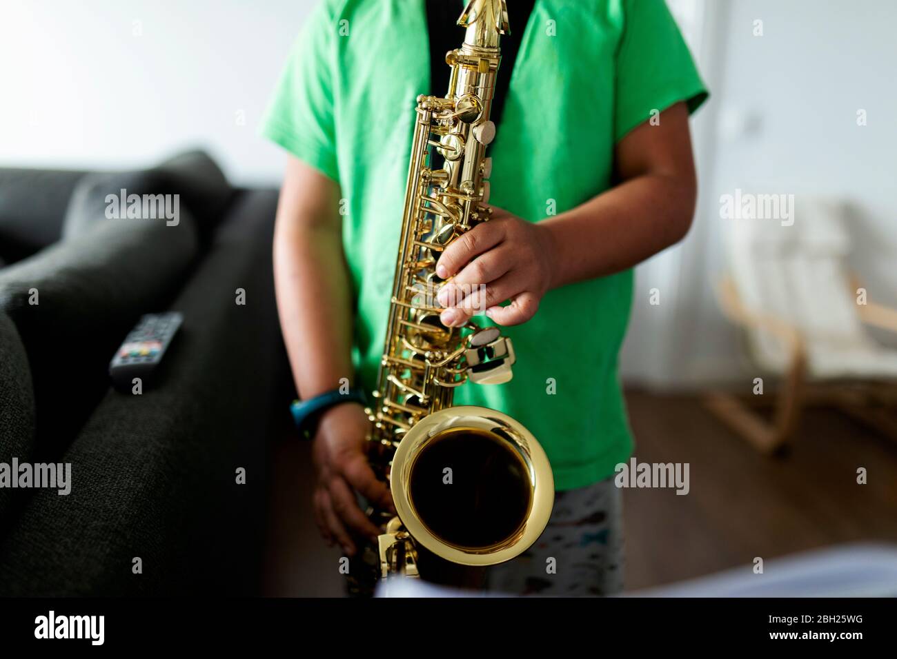 Children playing saxophone hi-res stock photography and images - Alamy
