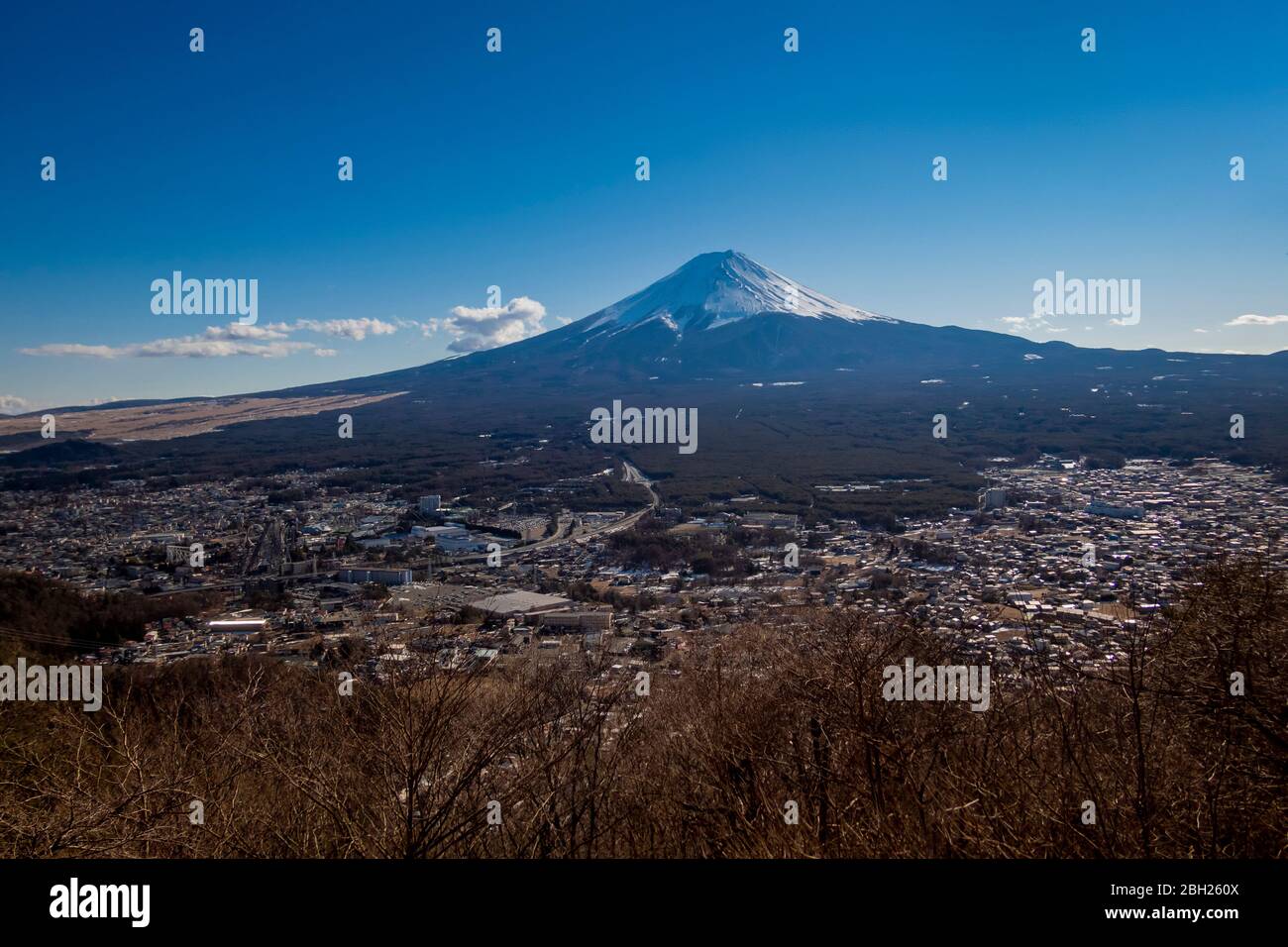 The peak of Mountain Fuji under clear blue sky in the midday Stock ...