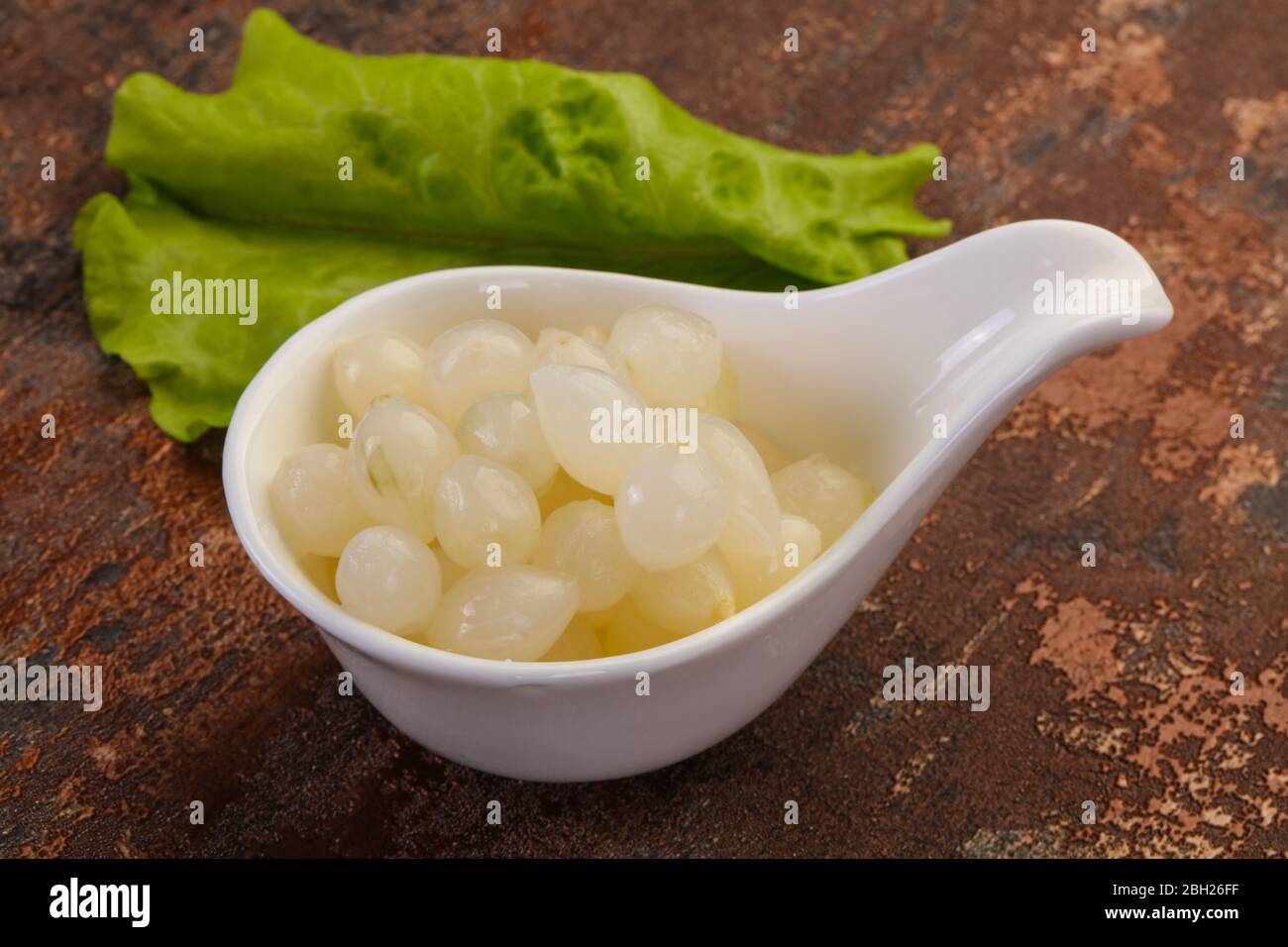 Pickled baby onion in the bowl Stock Photo - Alamy