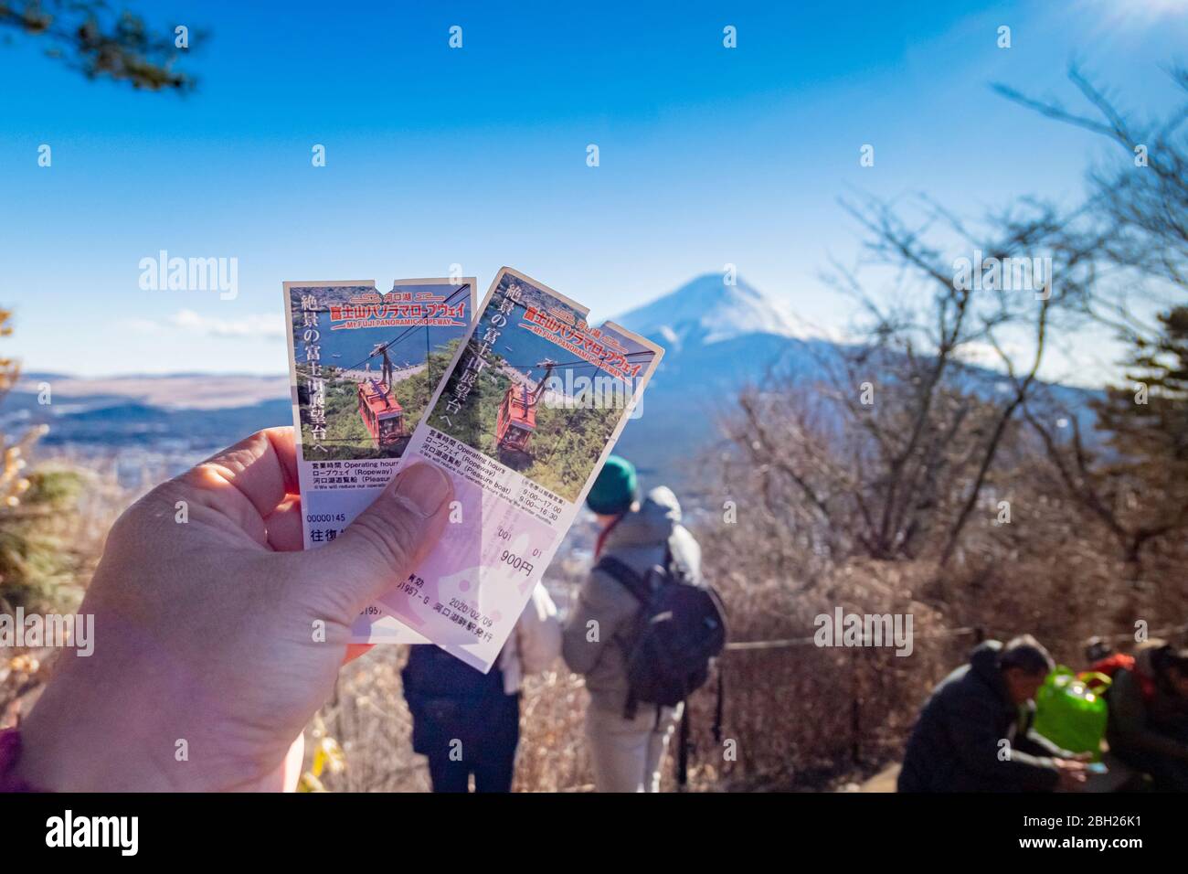 The mount Fuji Panoramic Ropeway tickets on hand with Mt. Fuji as ...