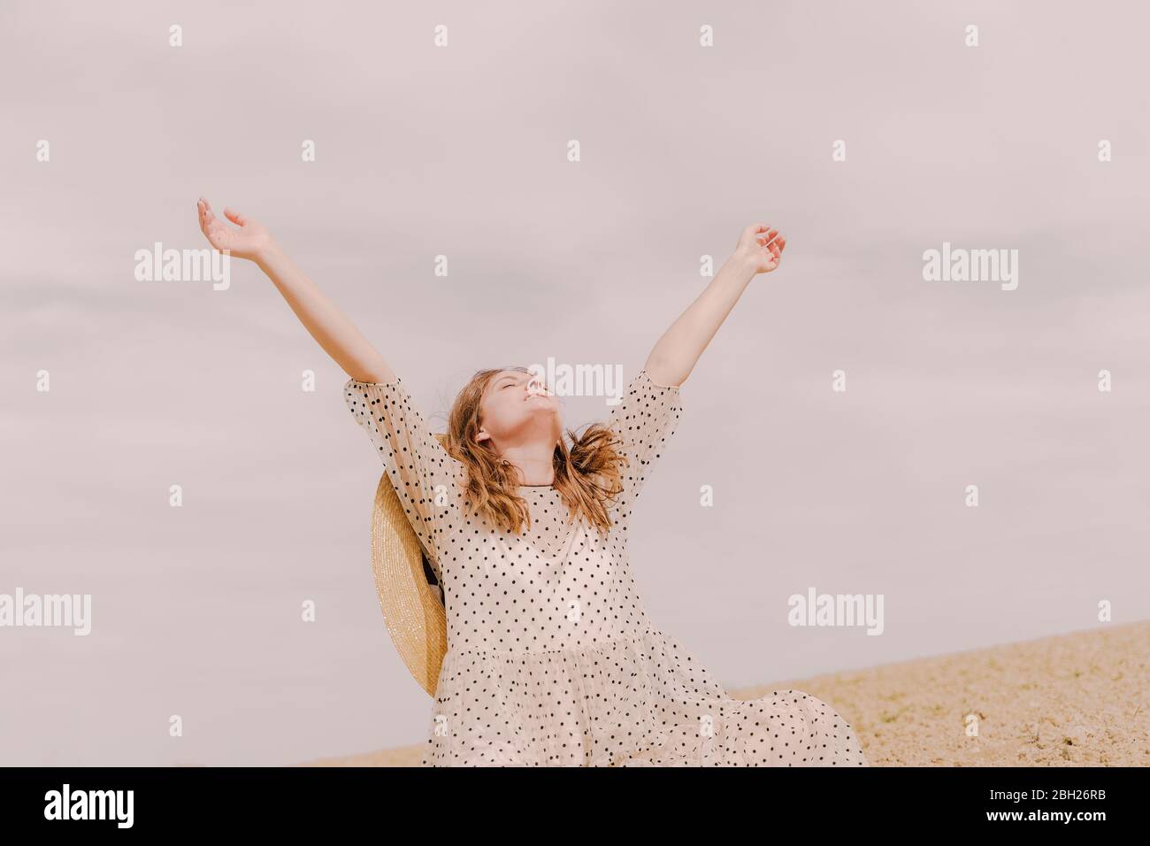 Raising dress hi-res stock photography and images - Alamy