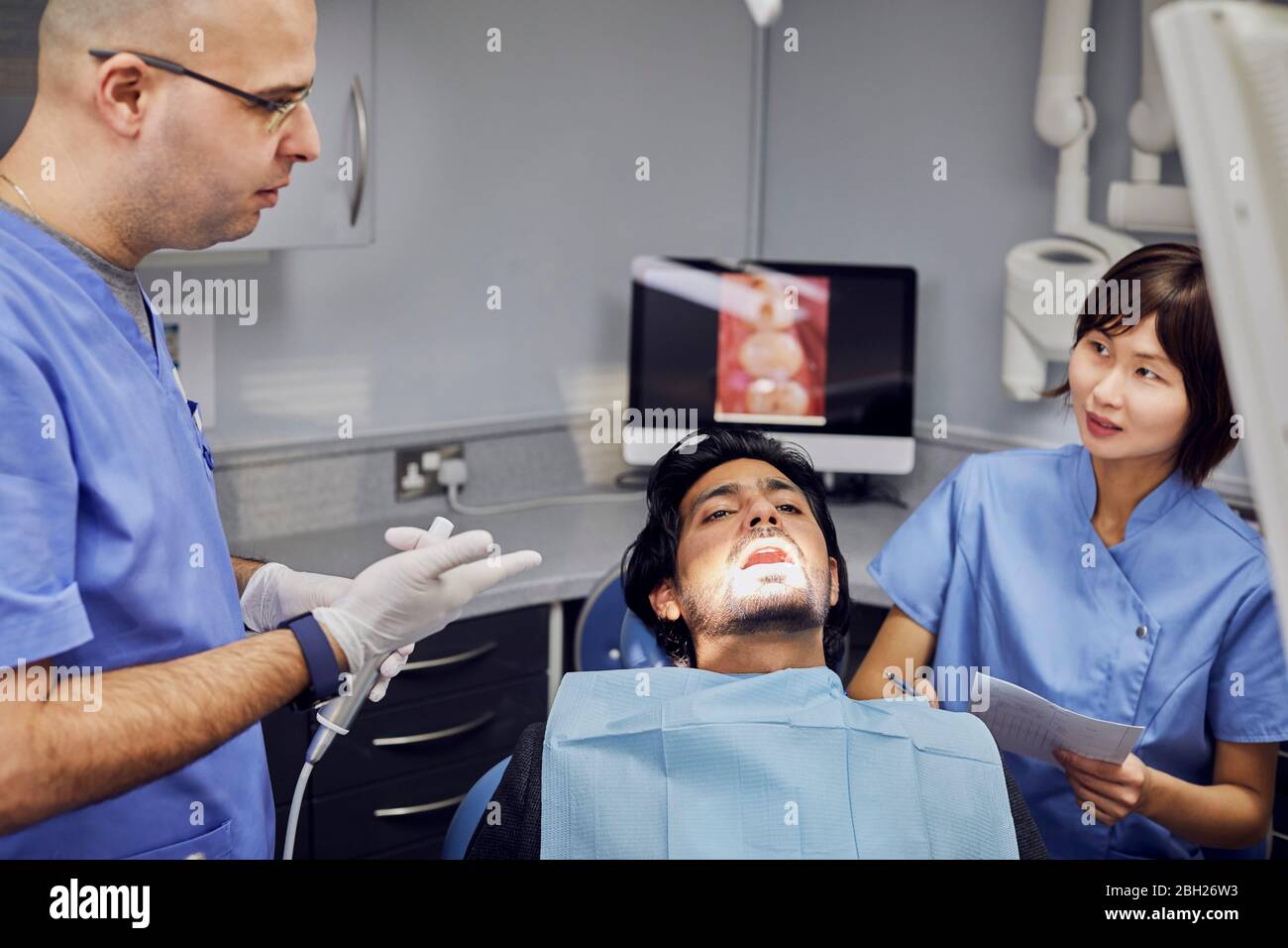 Receiving medical treatment hi-res stock photography and images - Alamy