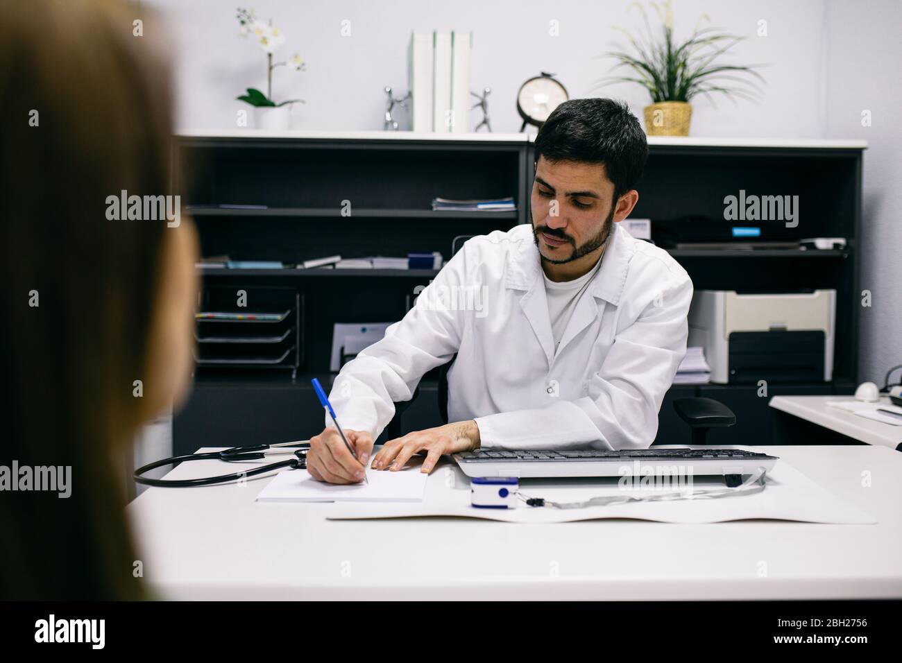 Medical consultation family hi-res stock photography and images - Alamy