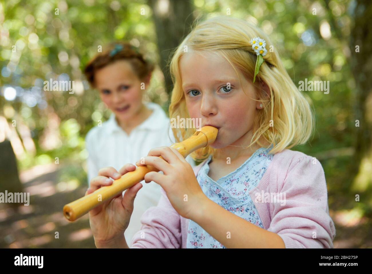 Girl playing recorder hi-res stock photography and images - Alamy