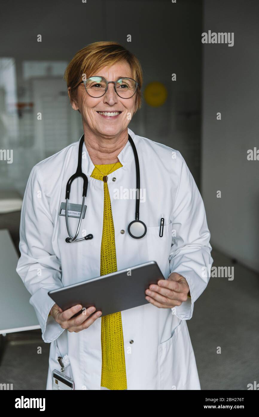 Smiling family doctor stethoscope hi-res stock photography and images ...