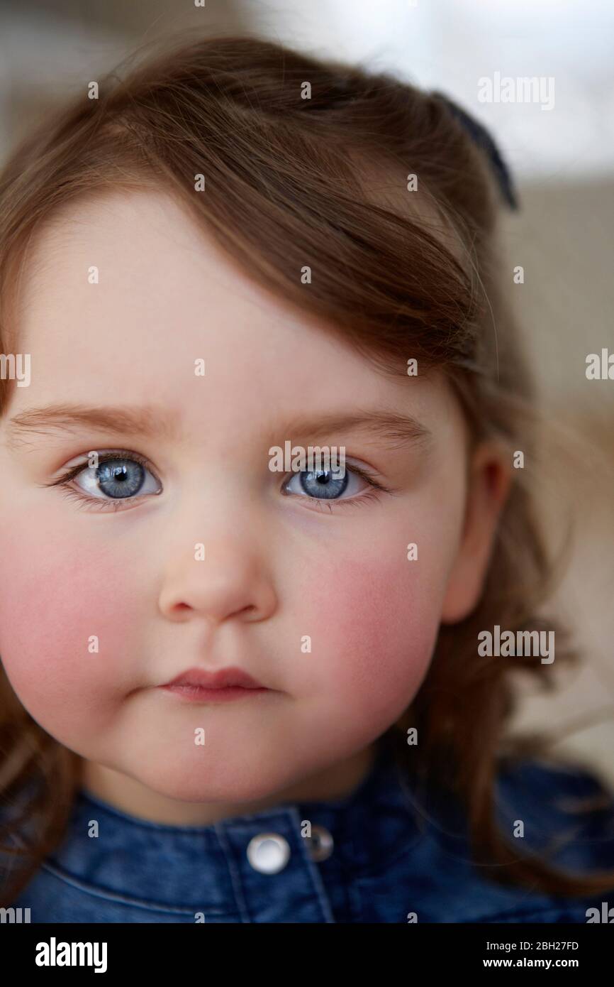 Girl with brown hair and blue eyes hi-res stock photography and images ...