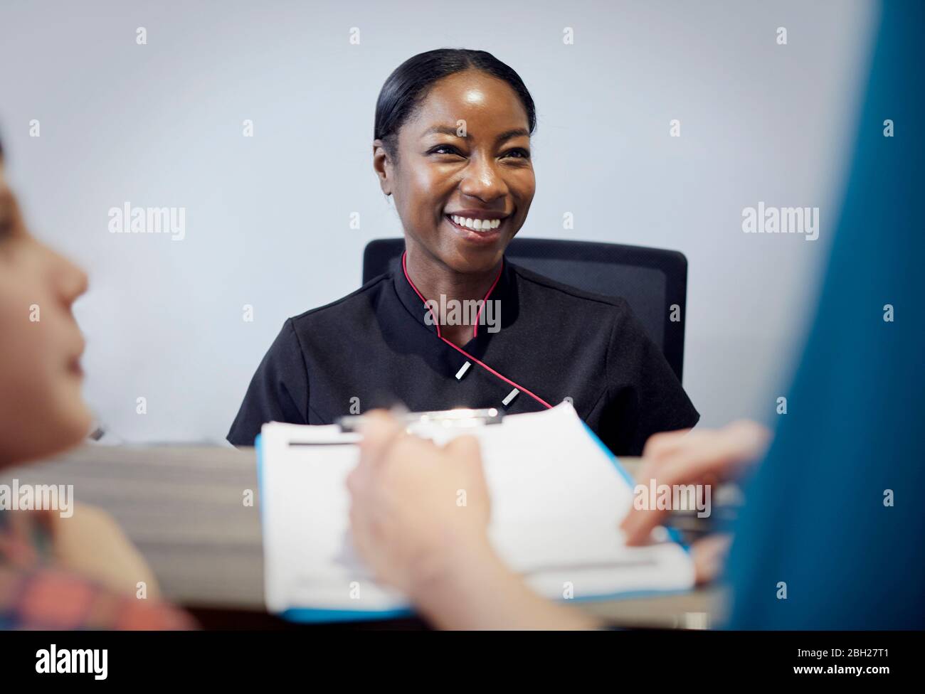 African receptionist hi-res stock photography and images - Alamy
