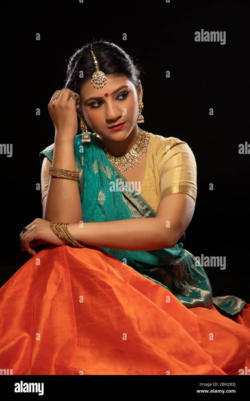 Sitting gracefully woman hi-res stock photography and images - Alamy