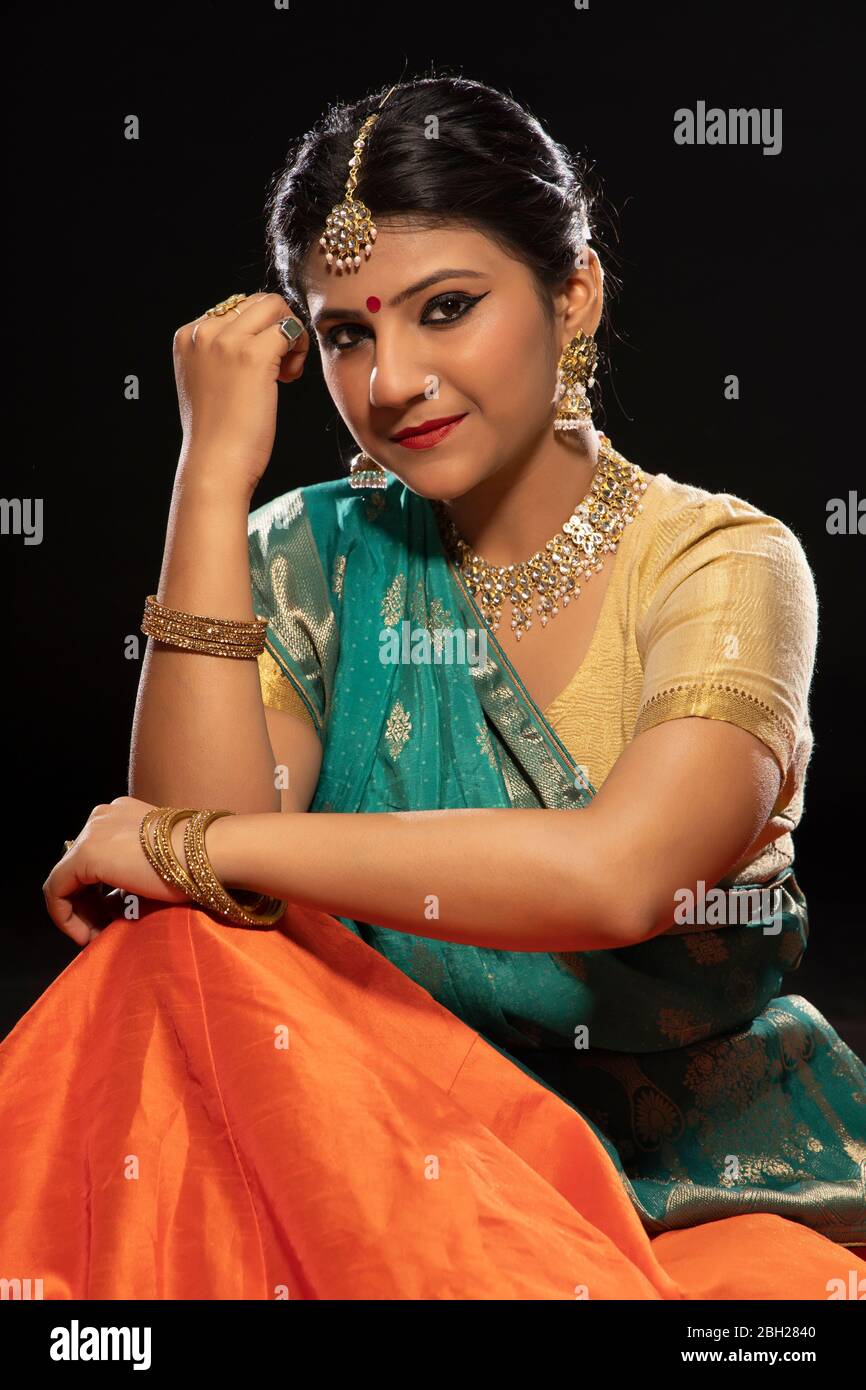 Sitting gracefully woman hi-res stock photography and images - Alamy