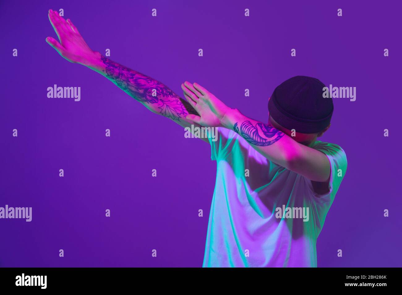 Winner's gesture, dab, dabbing. Caucasian man's portrait isolated on ...