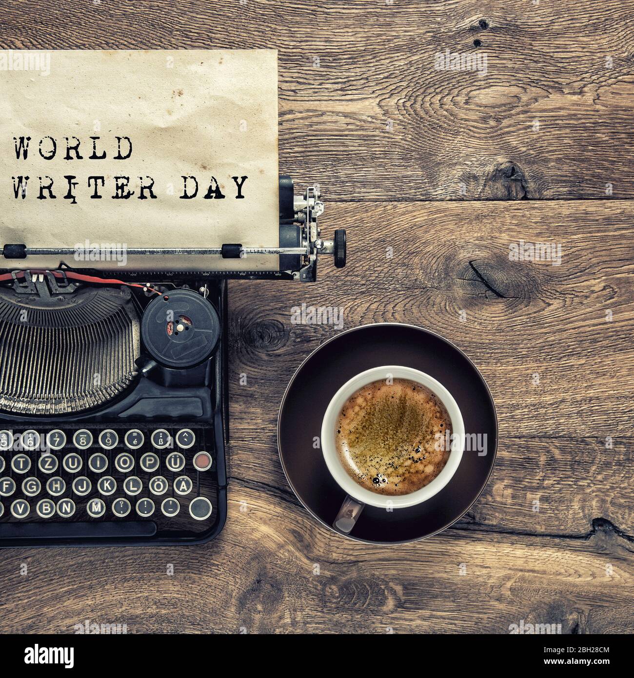 World writer day. Antique typewriter and black coffee Stock Photo - Alamy