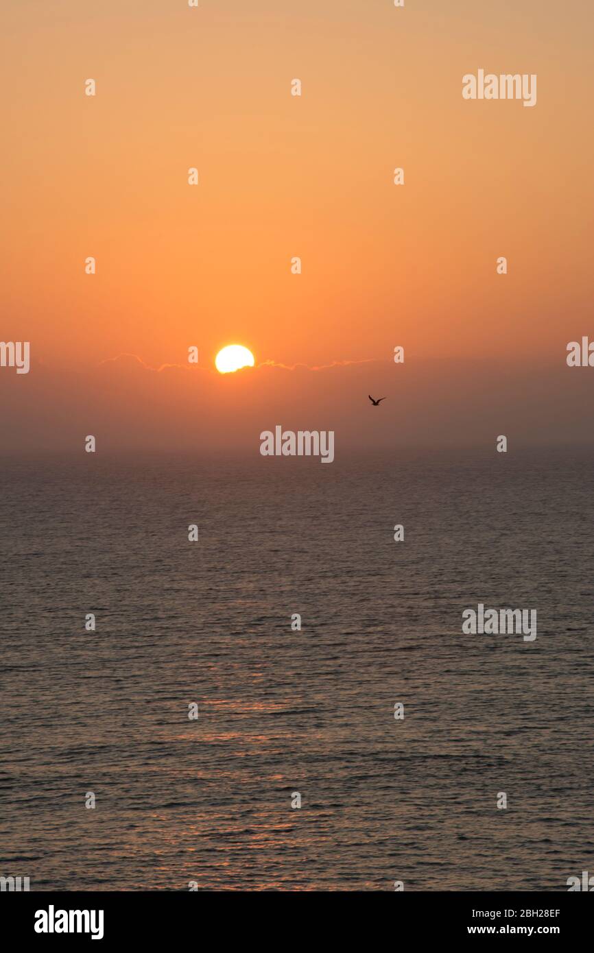 Moody sunset of ocean hi-res stock photography and images - Alamy
