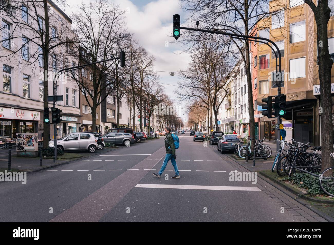 Walking in empty street hi-res stock photography and images - Alamy
