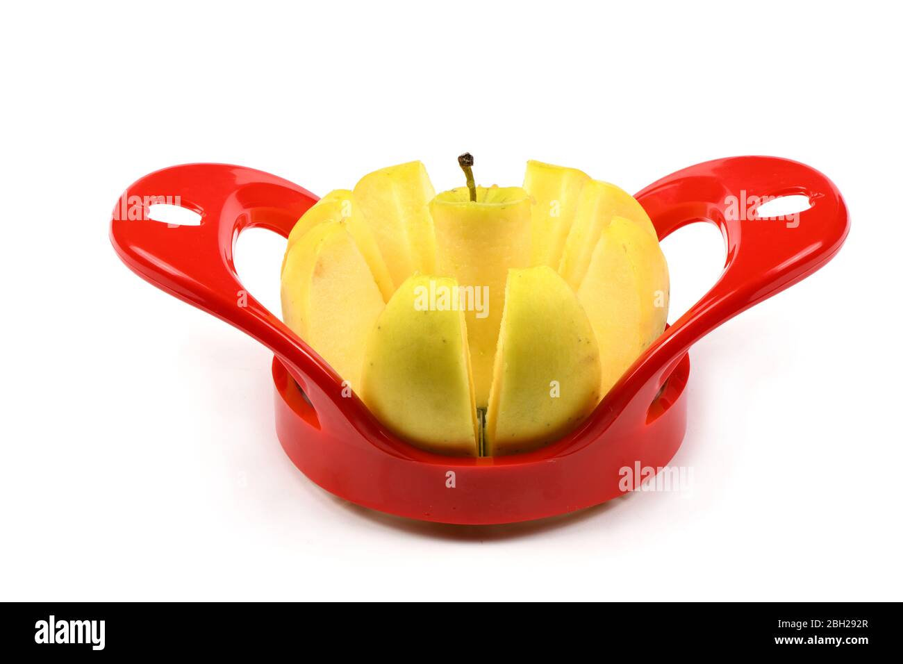 Red device for slicing apples isolated on white background. High ...