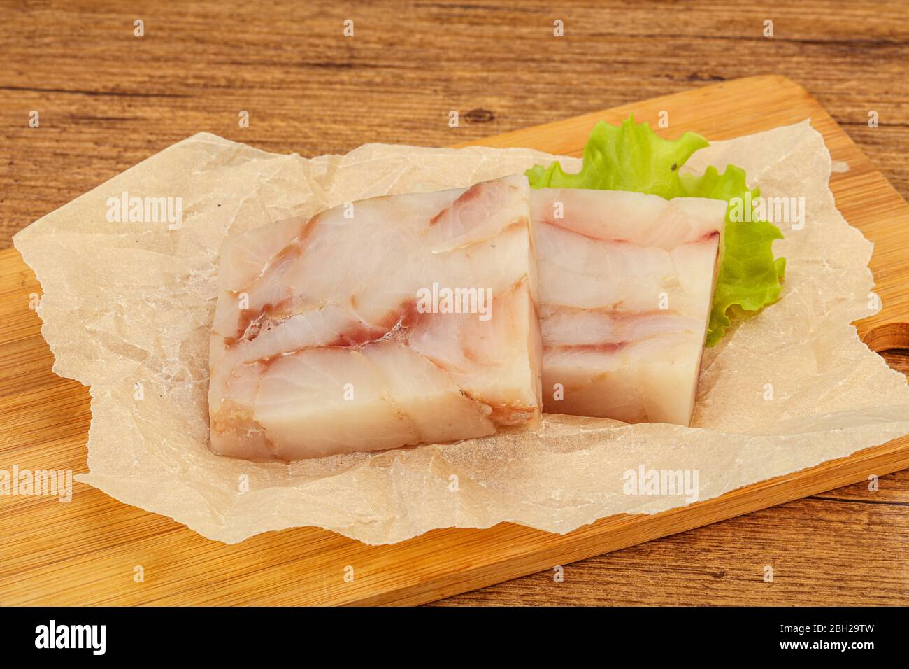 Raw dietary pollock fish fillet for cooking Stock Photo - Alamy