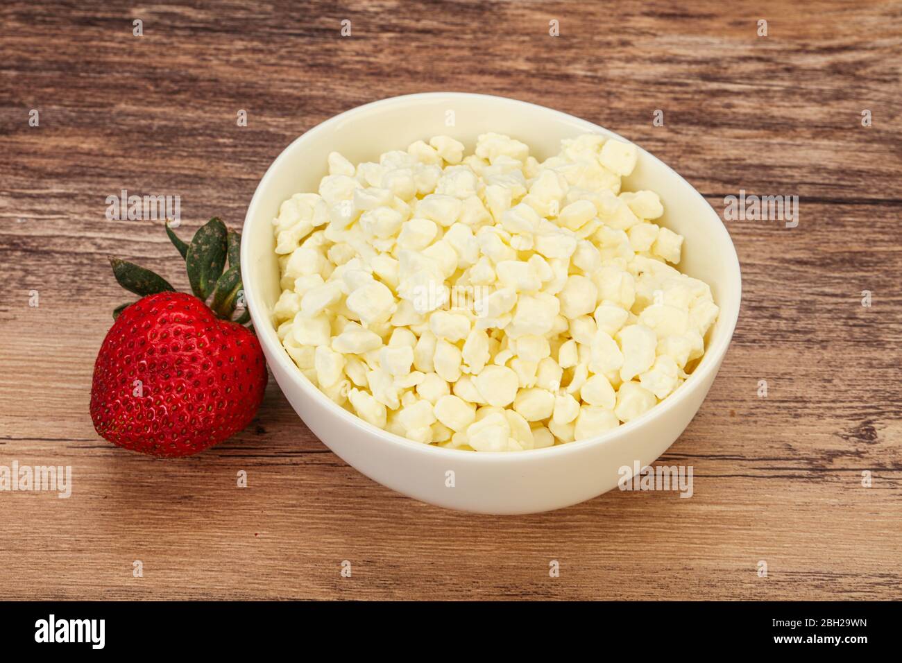 Dietary food - grain cottage cheese in the bowl Stock Photo - Alamy