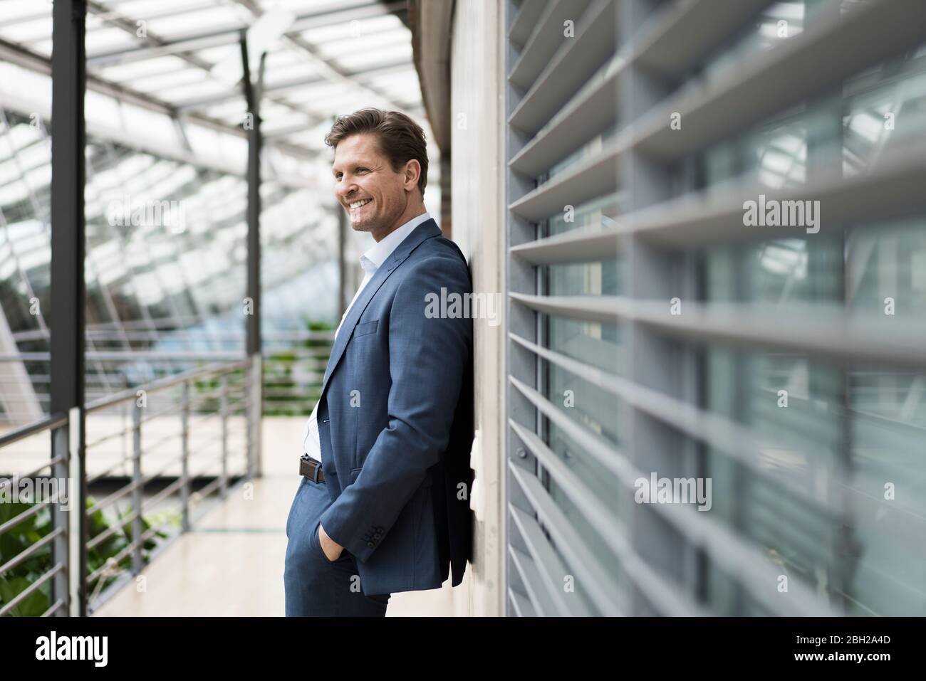 Businessman standing on gallery hi-res stock photography and images - Alamy