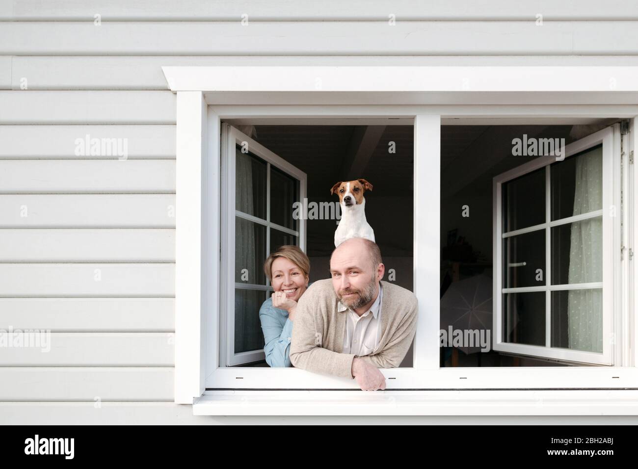 Leaning out the house window hi-res stock photography and images - Alamy