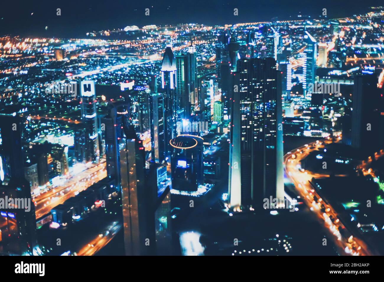 Aerial night view of Dubai in United Arab Emirates, metropolitan ...