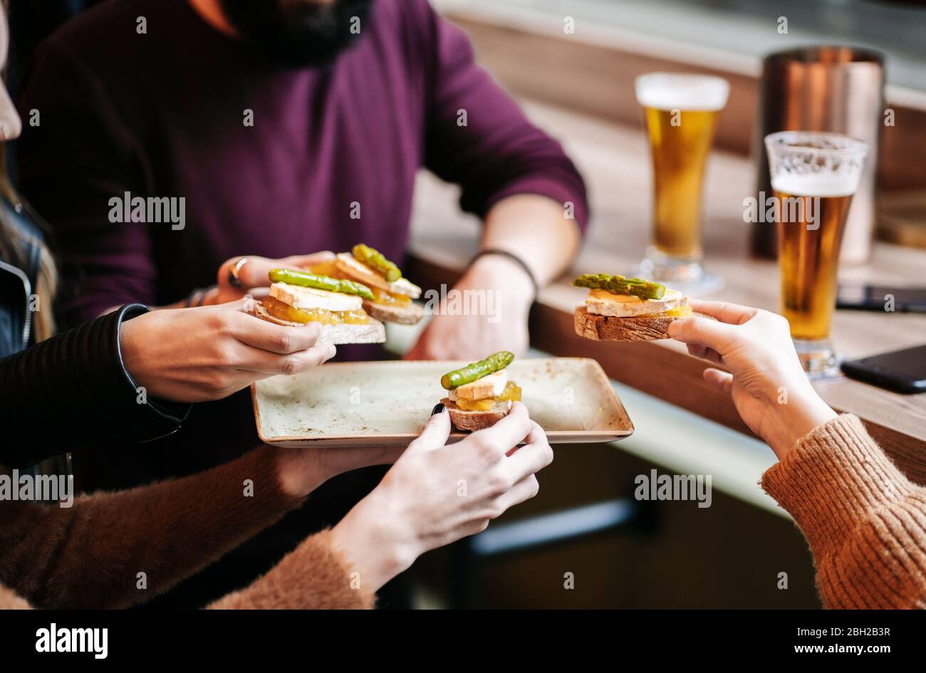 Sharing dishes hi-res stock photography and images - Alamy