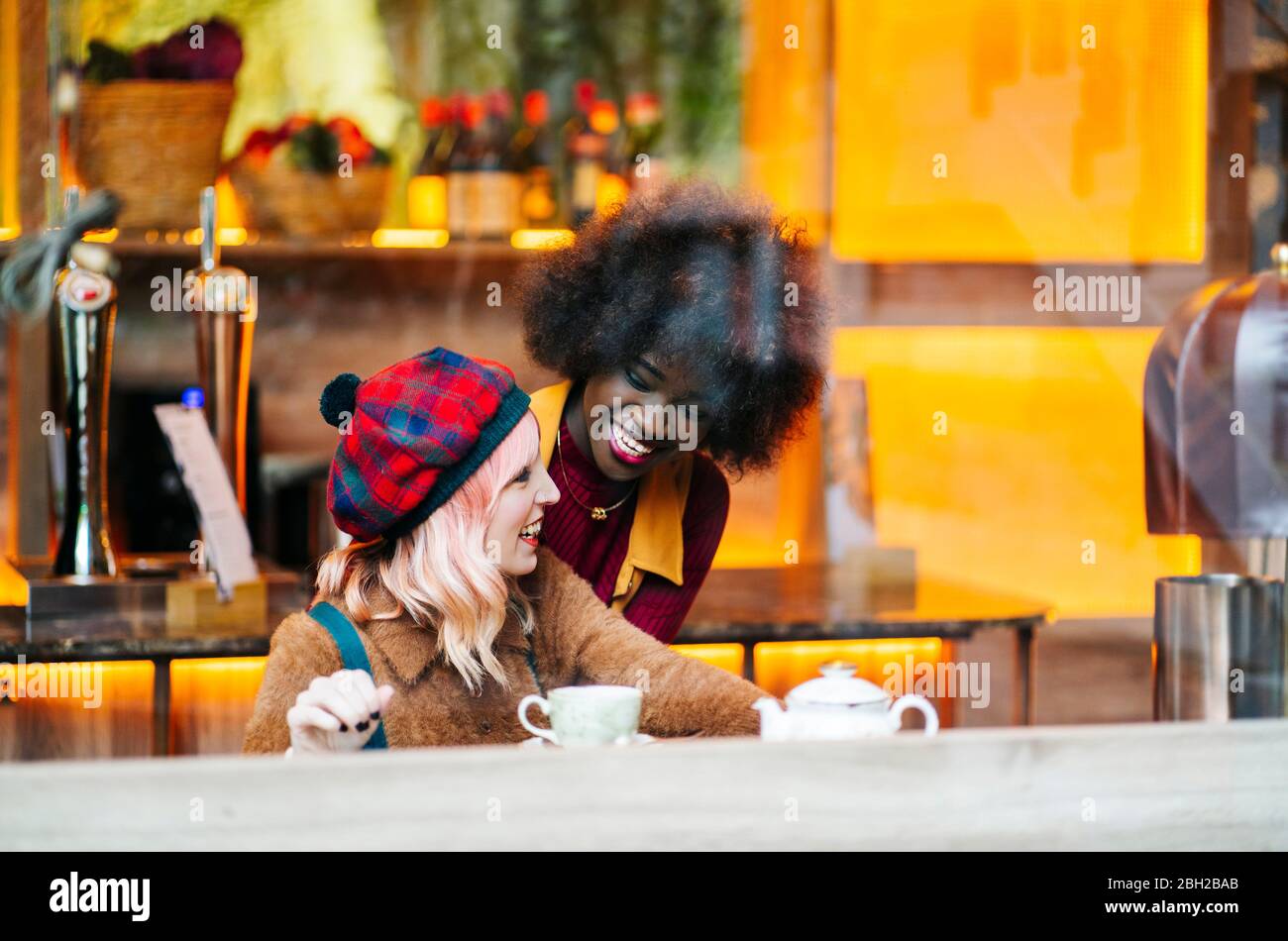 Two women drinking tea hi-res stock photography and images - Alamy