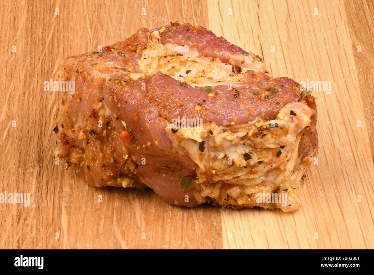 Fresh raw pork steak isolated on wood background. High resolution photo ...