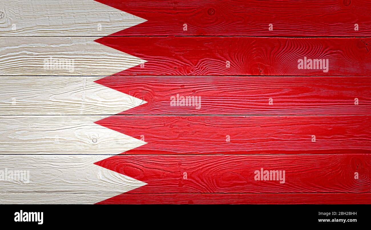Bahrain flag painted on old wood plank background. Brushed natural ...